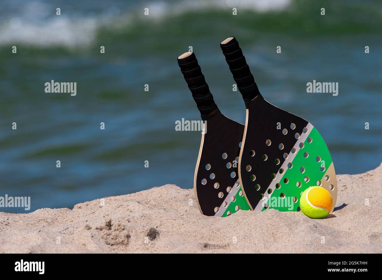 Rackets on beach hi-res stock photography and images - Alamy
