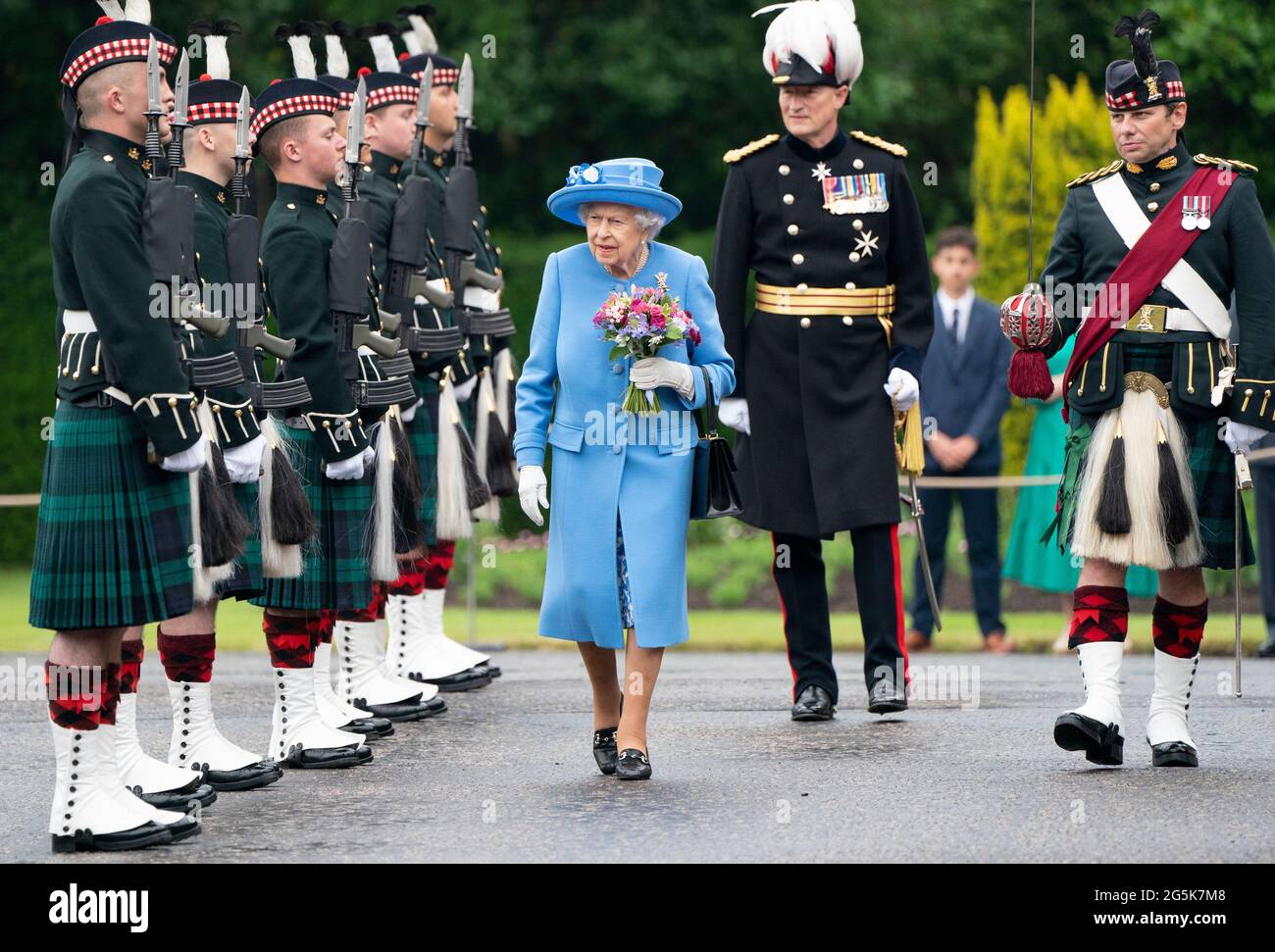 Queen Elizabeth II, who was accompanied by the Duke of Cambridge, known ...