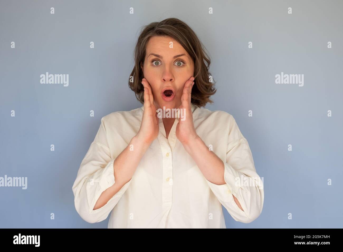 Caucasian woman with Oh my god, wow emotion expression Stock Photo - Alamy