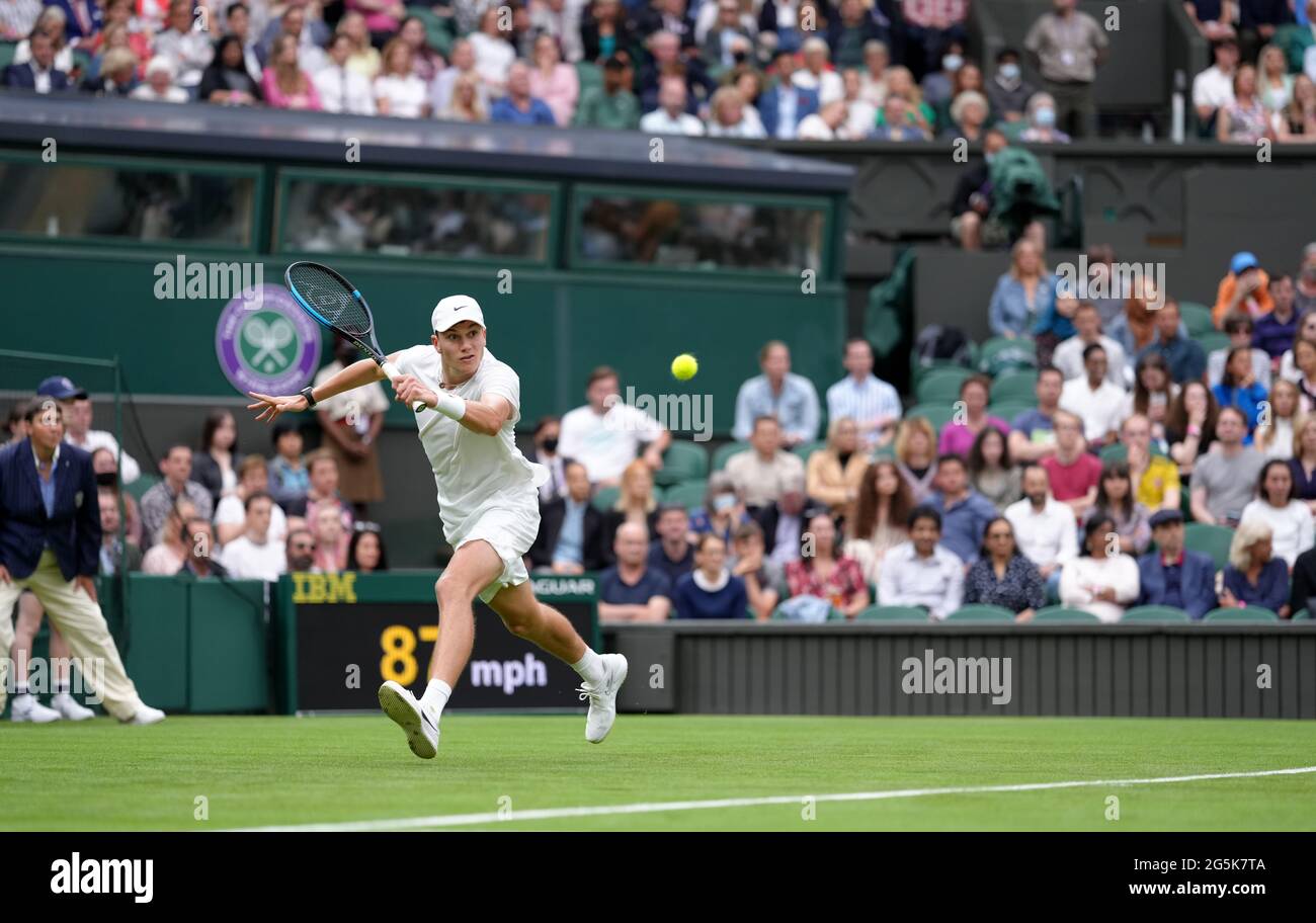 Jack Draper in action against Novak Djokovic on centre court on day one ...