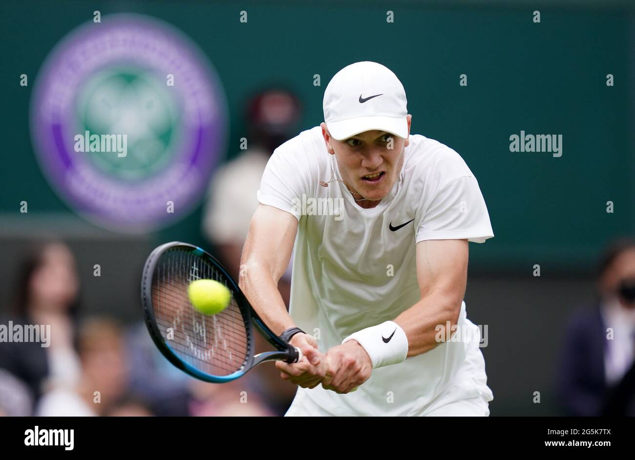 Jack Draper in action against Novak Djokovic on centre court on day one ...