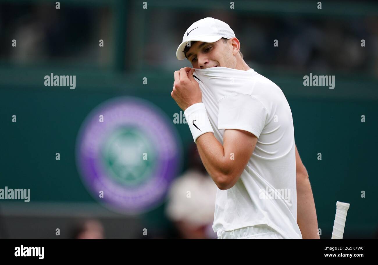Jack Draper reacts in the match against Novak Djokovic on centre court ...