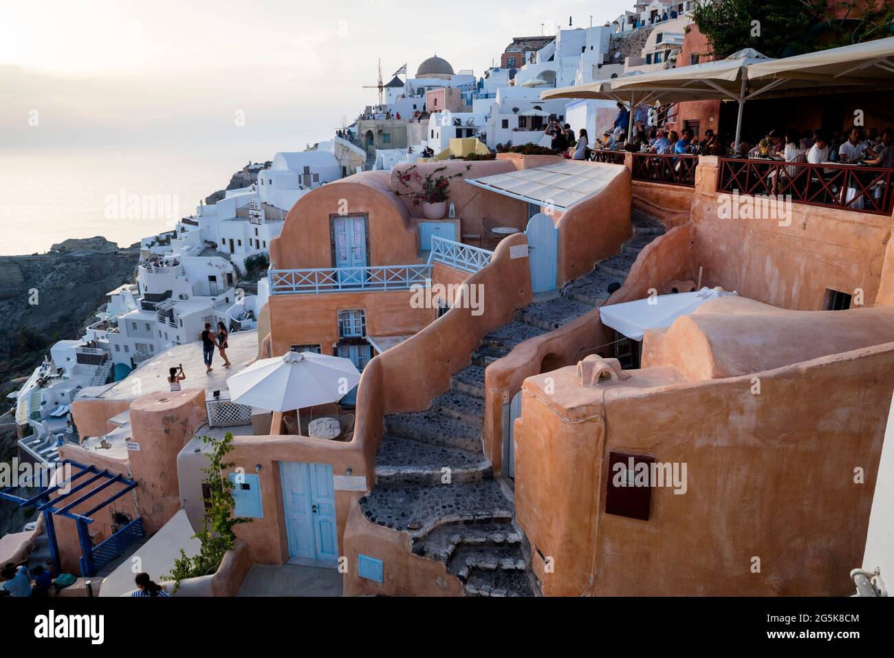 Dancing on the rooftop in Oia, Santorini, Greece Stock Photo - Alamy