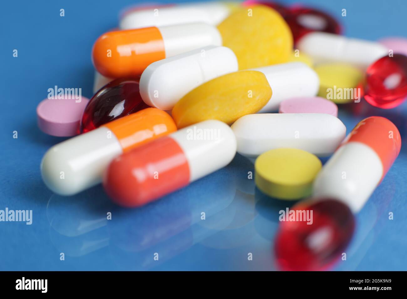 Colorful of tablets and capsules pill in blister packaging arranged ...