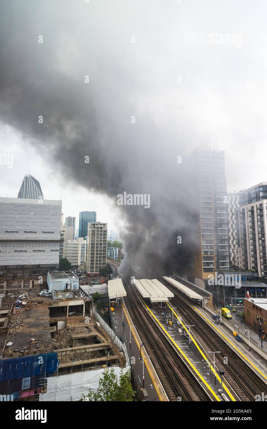 Smoke column over the Elephant and Castle railway station, London ...