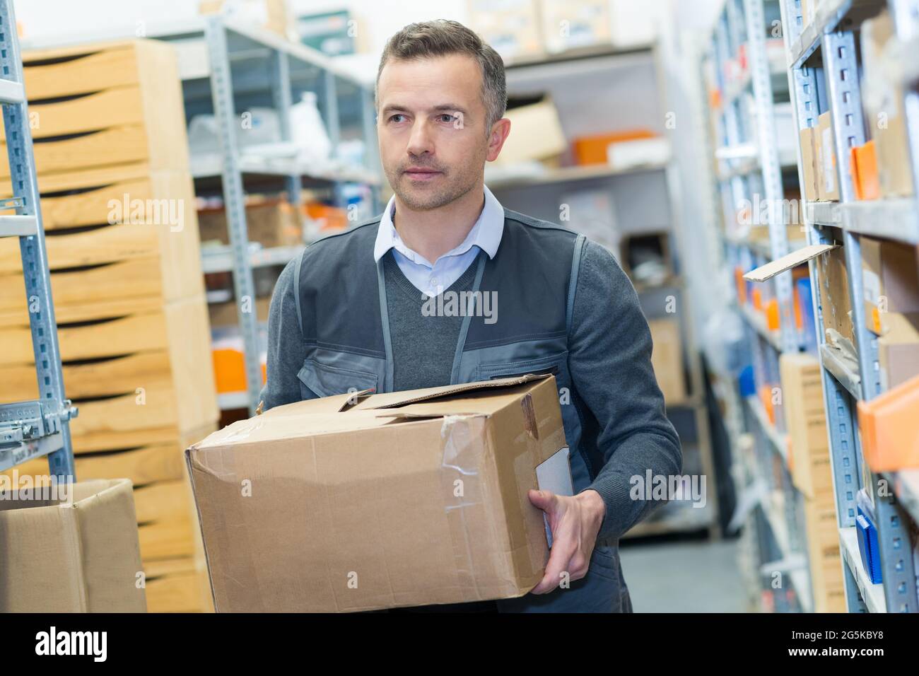 a businessman carrying empty box Stock Photo - Alamy