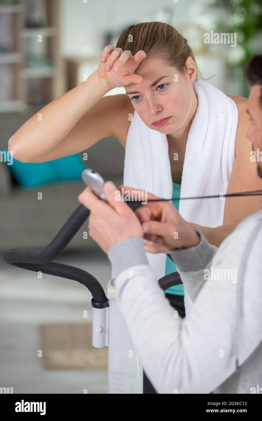 Woman rowing machine home hi-res stock photography and images - Alamy