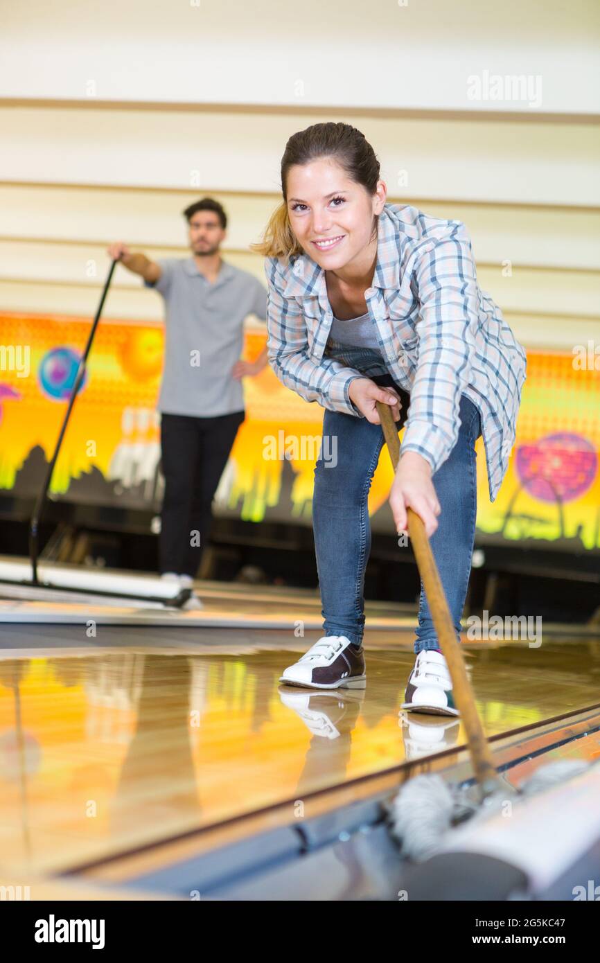 staffs of bowling center cleaning the area Stock Photo - Alamy