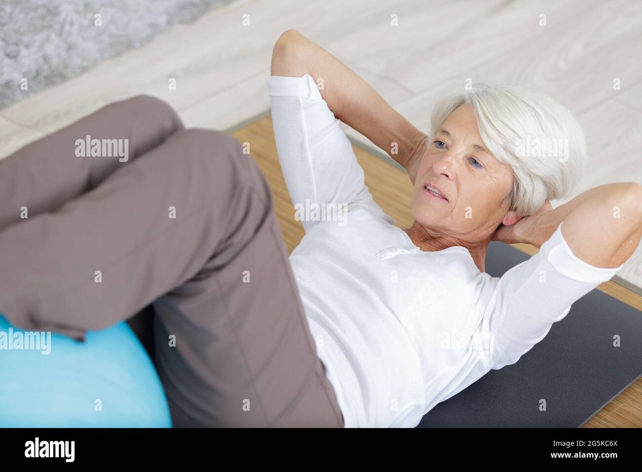 Model female crunches hi-res stock photography and images - Alamy