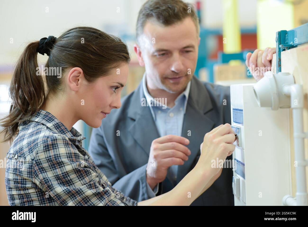 close up of a couple working with keys Stock Photo - Alamy