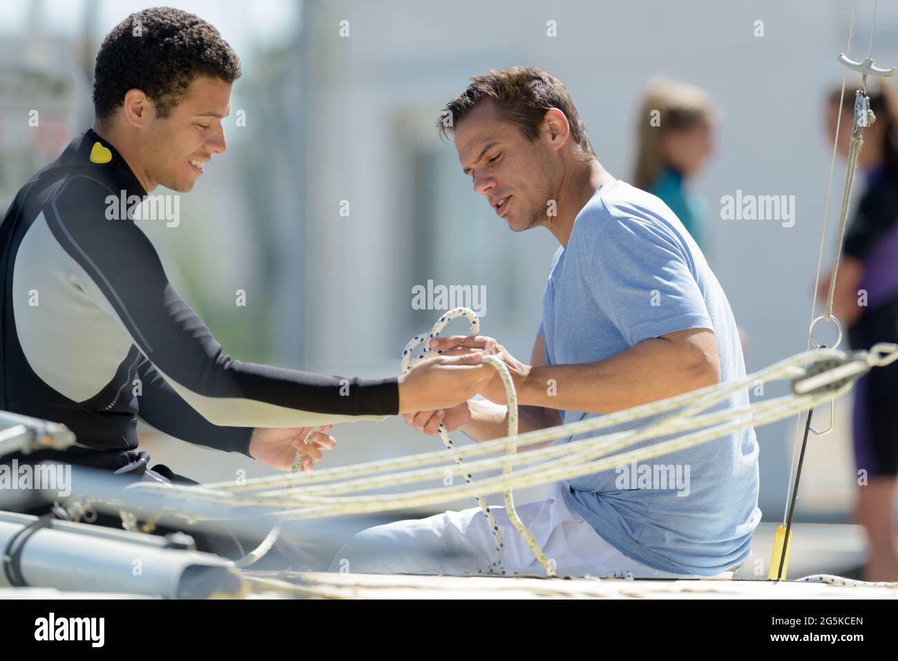 team and sport sailors training Stock Photo - Alamy