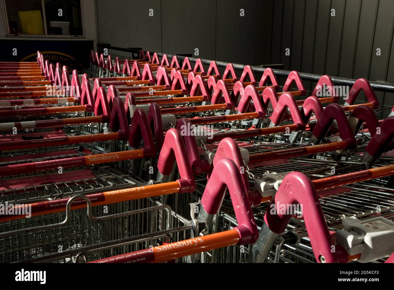 Shopping trolleys outside supermarket in London,England,UK Stock Photo ...