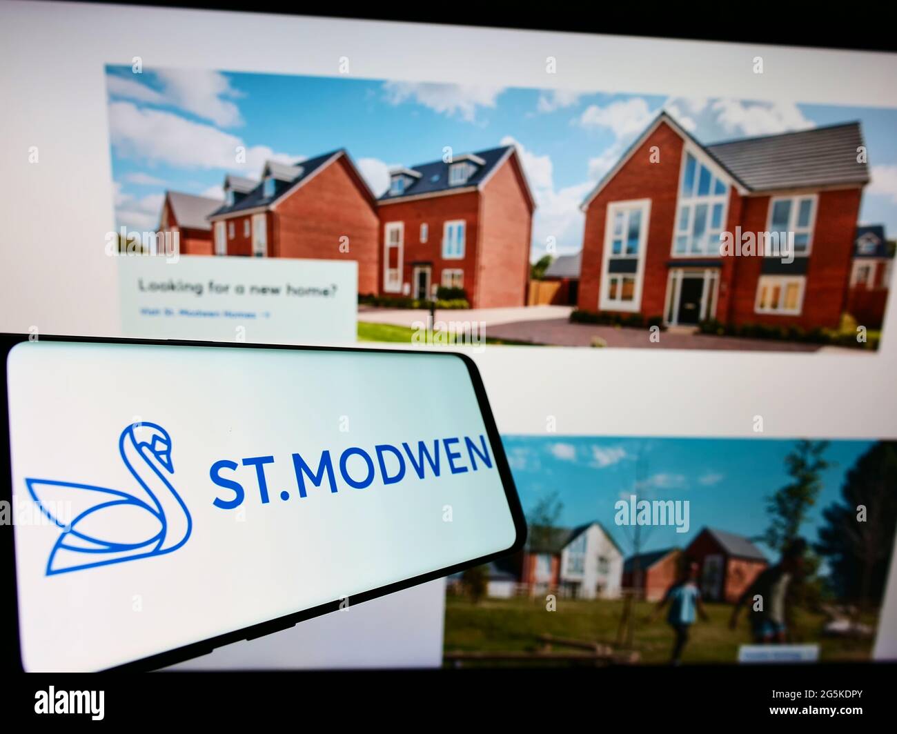 Mobile phone with logo of British property company St. Modwen ...