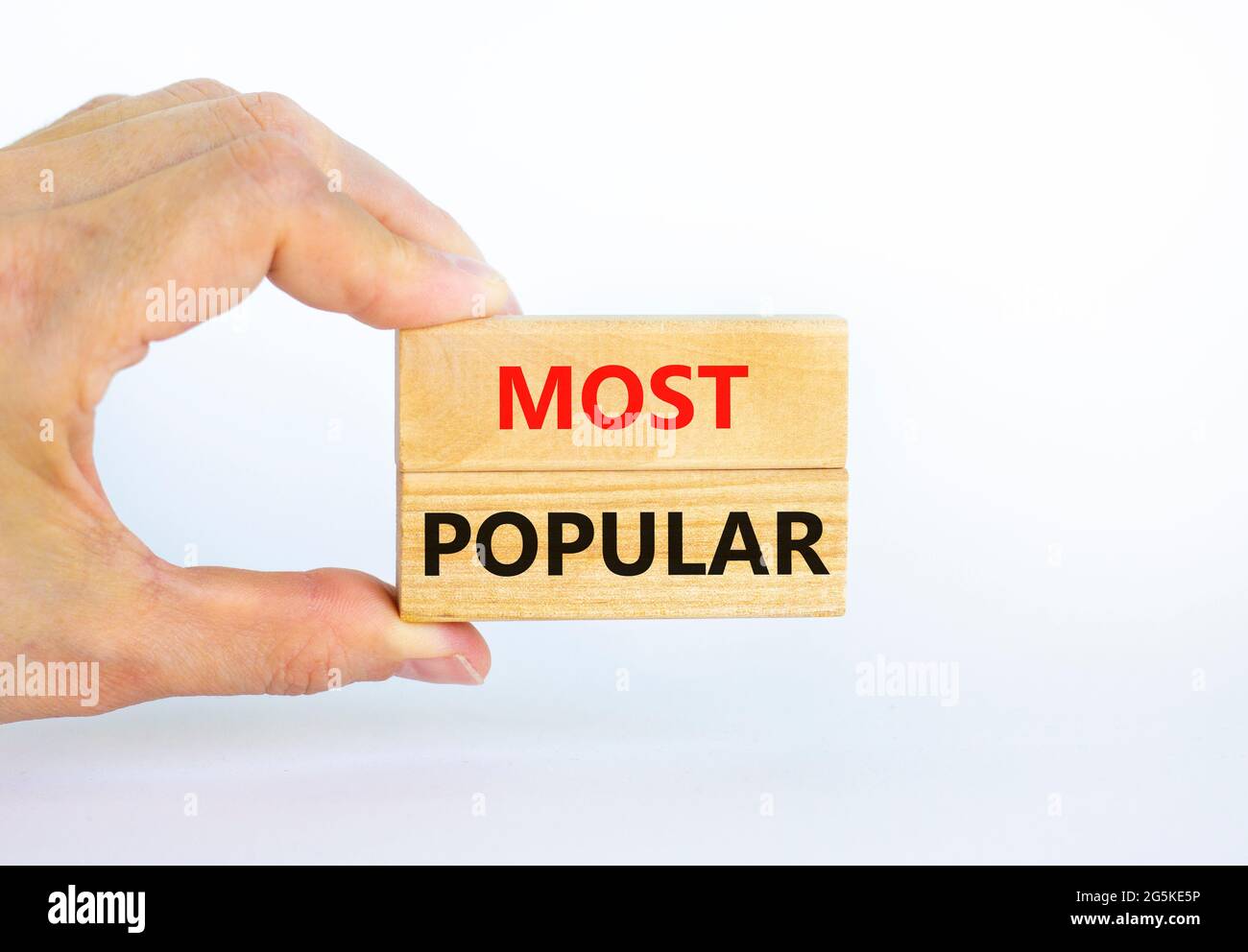 Most popular symbol. Concept words Most popular on wooden blocks on a ...