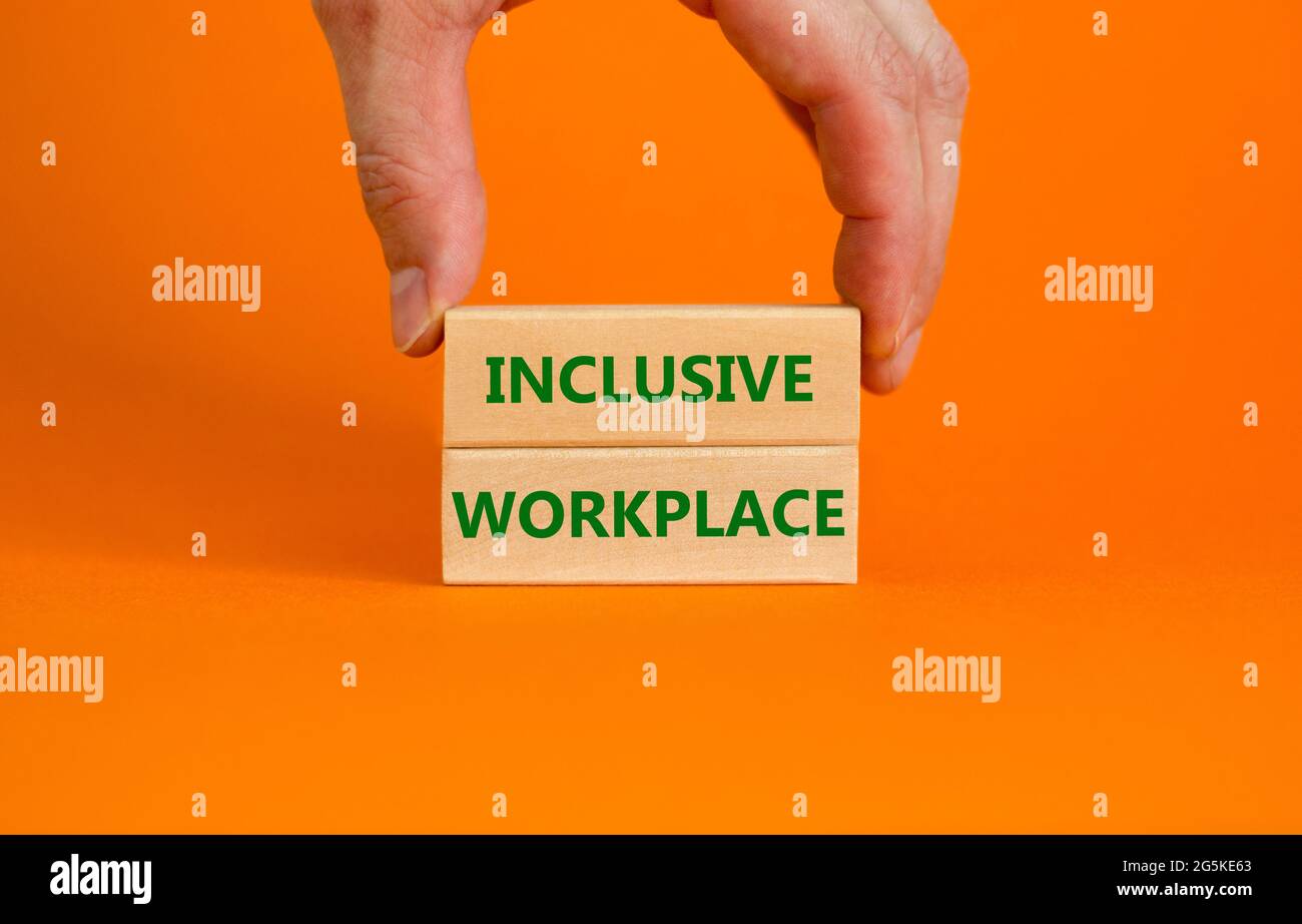 Inclusive workplace symbol. Wooden blocks with words Inclusive ...