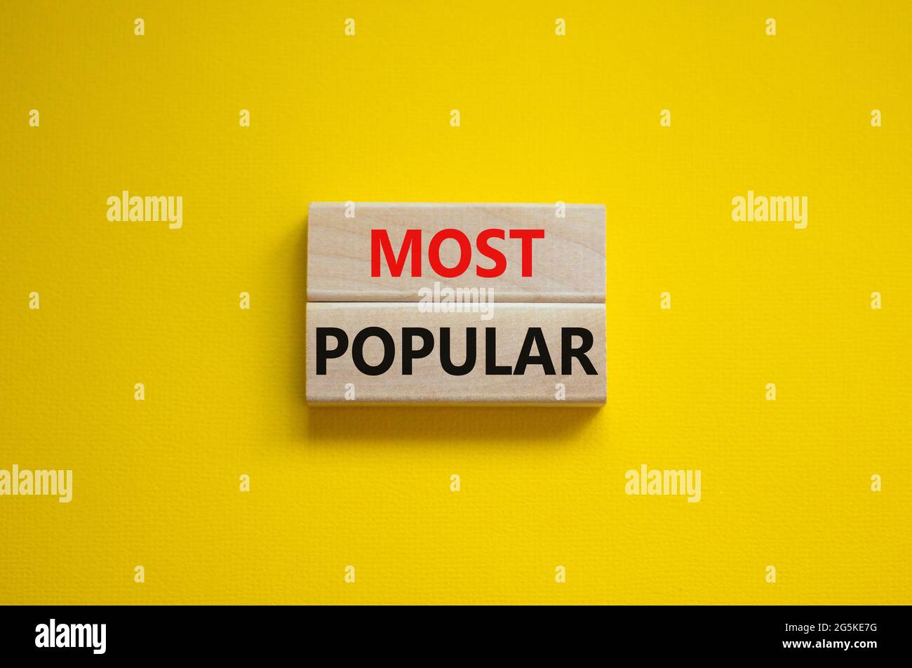 Most popular symbol. Concept words Most popular on wooden blocks on a ...