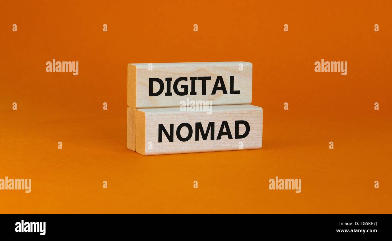 Digital nomad symbol. Wooden blocks with words Digital nomad on ...