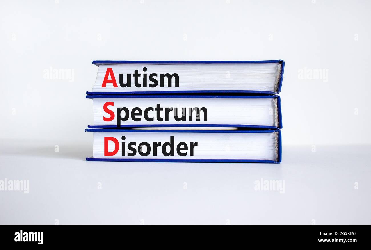 ASD, autism spectrum disorder symbol. Books with words 'ASD, autism ...