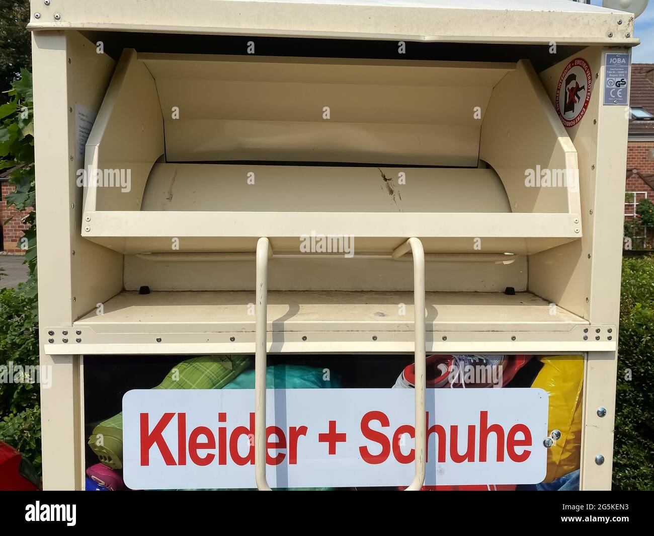 Old clothes collection container hi-res stock photography and images ...