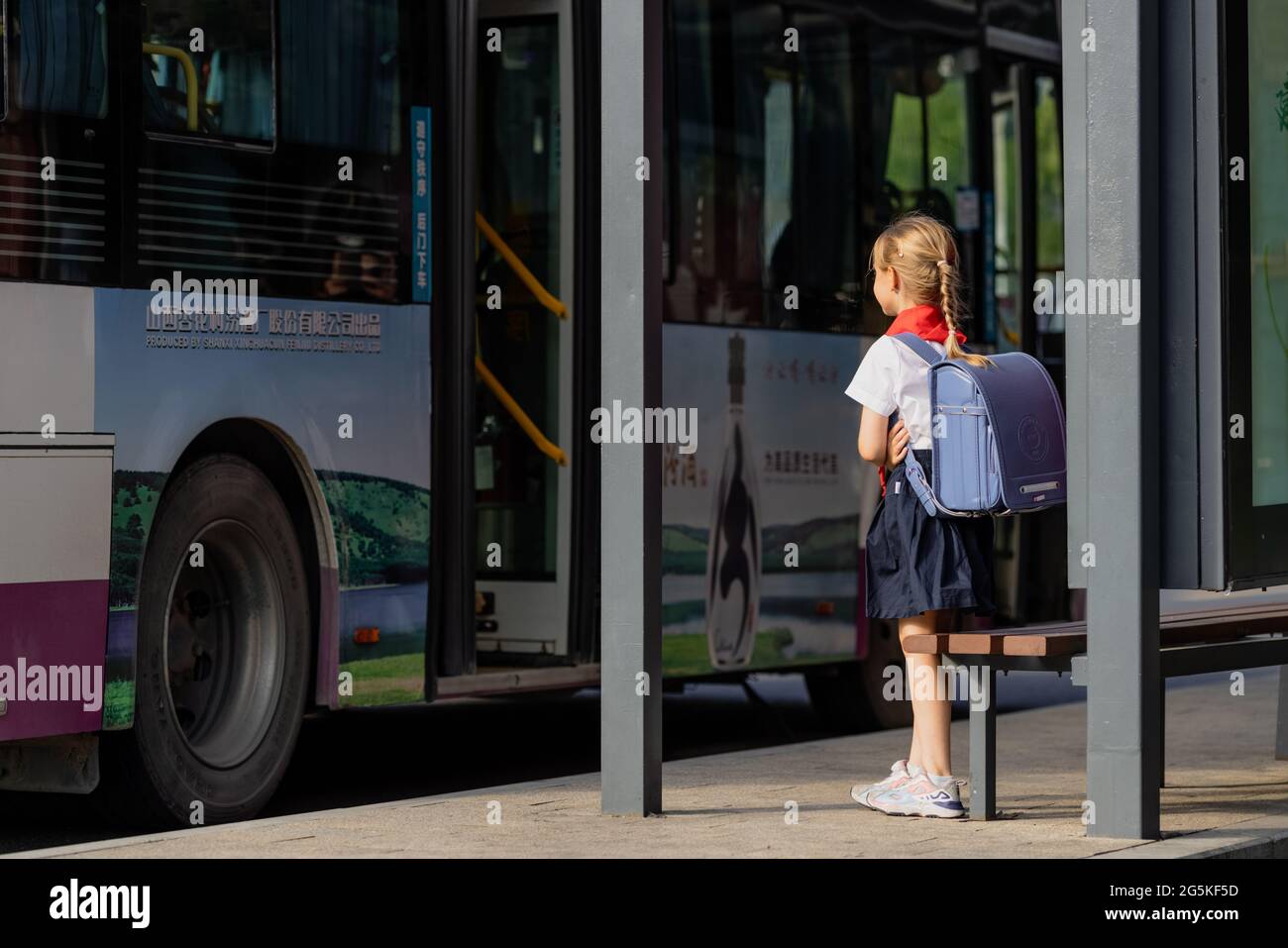 Huzhou, China 22 June 2021: Happy caucasian girl back to school in ...