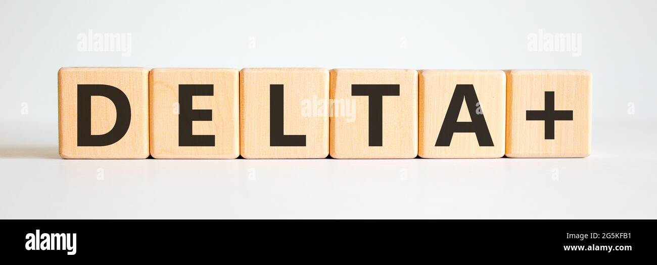 Covid-19 delta plus variant symbol. Wooden cubes with words Delta plus ...