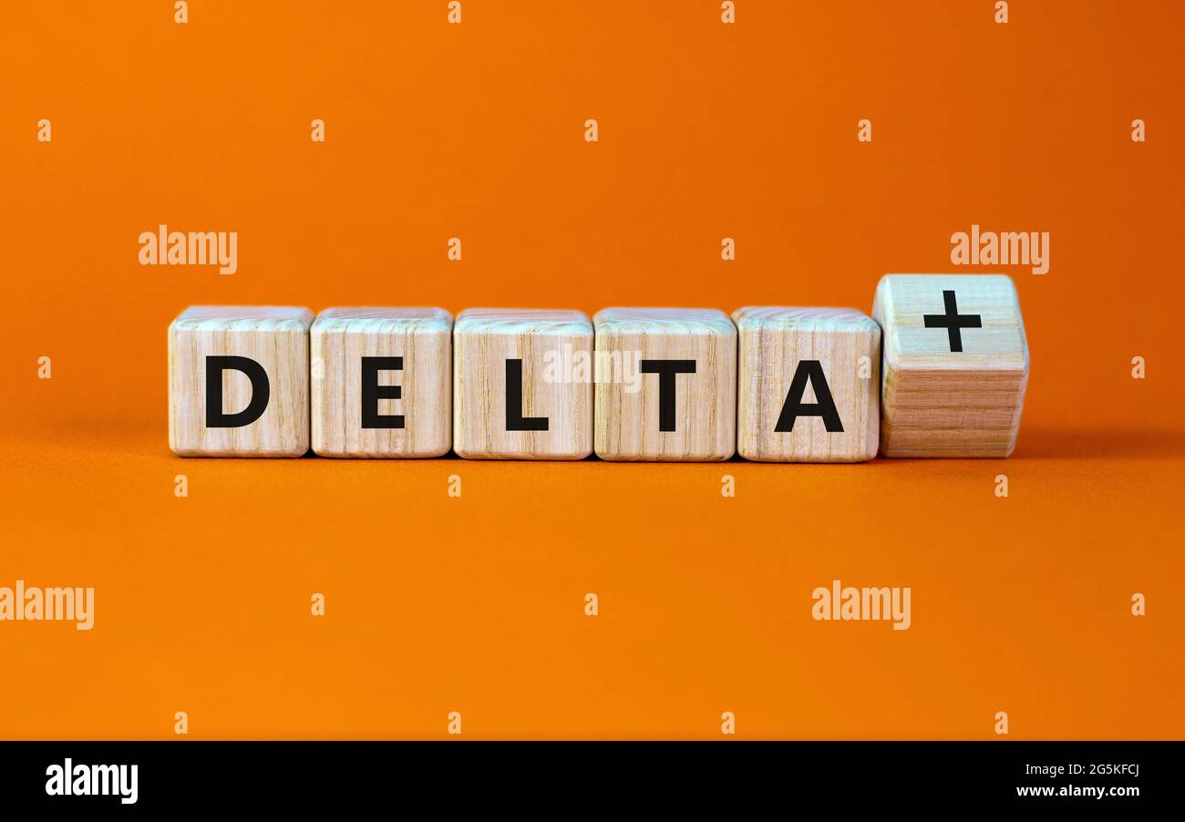 Covid-19 delta plus variant symbol. Turned the wooden cube and changed ...