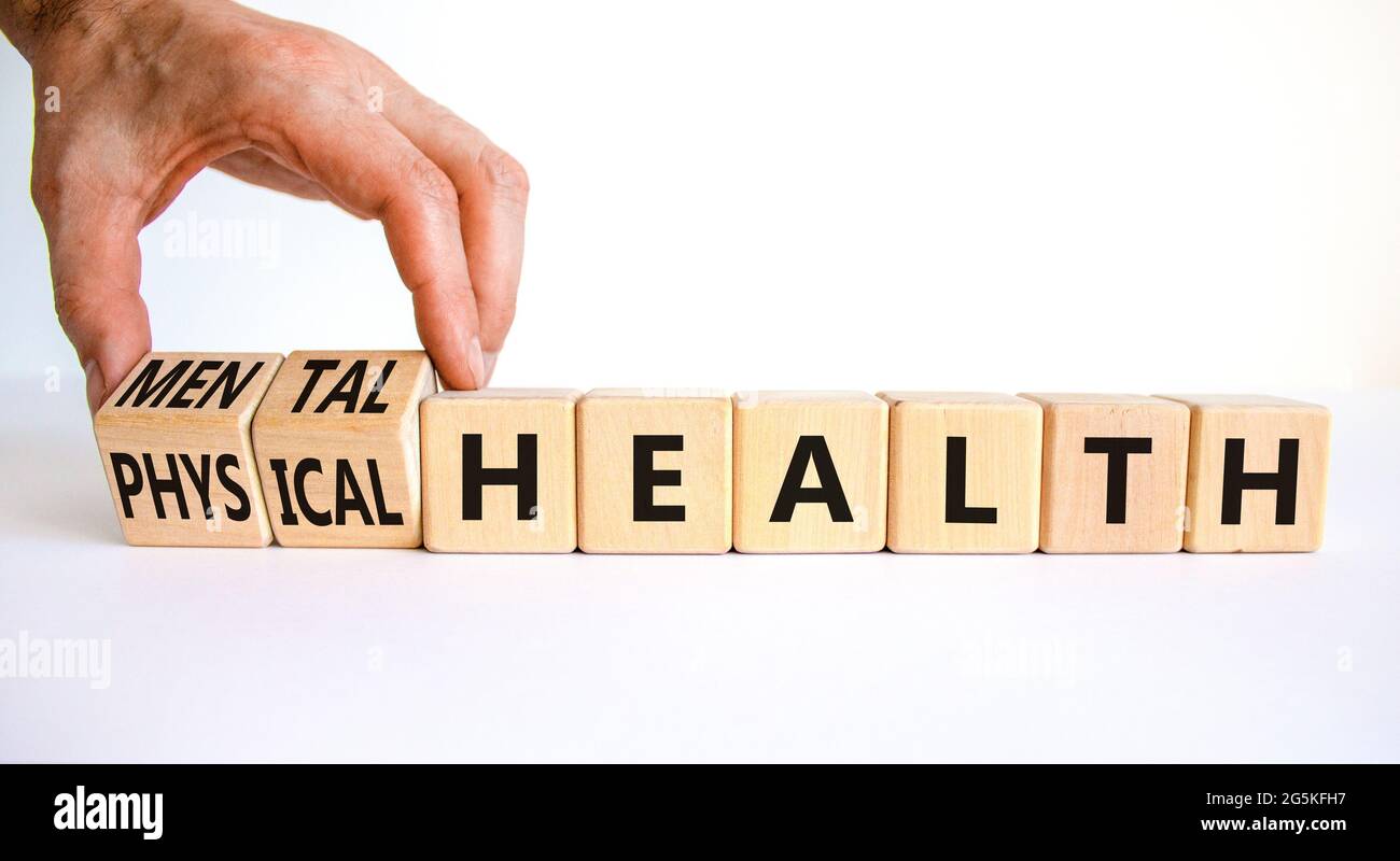 Mental or physical health symbol. Doctor turns wooden cubes and changes ...