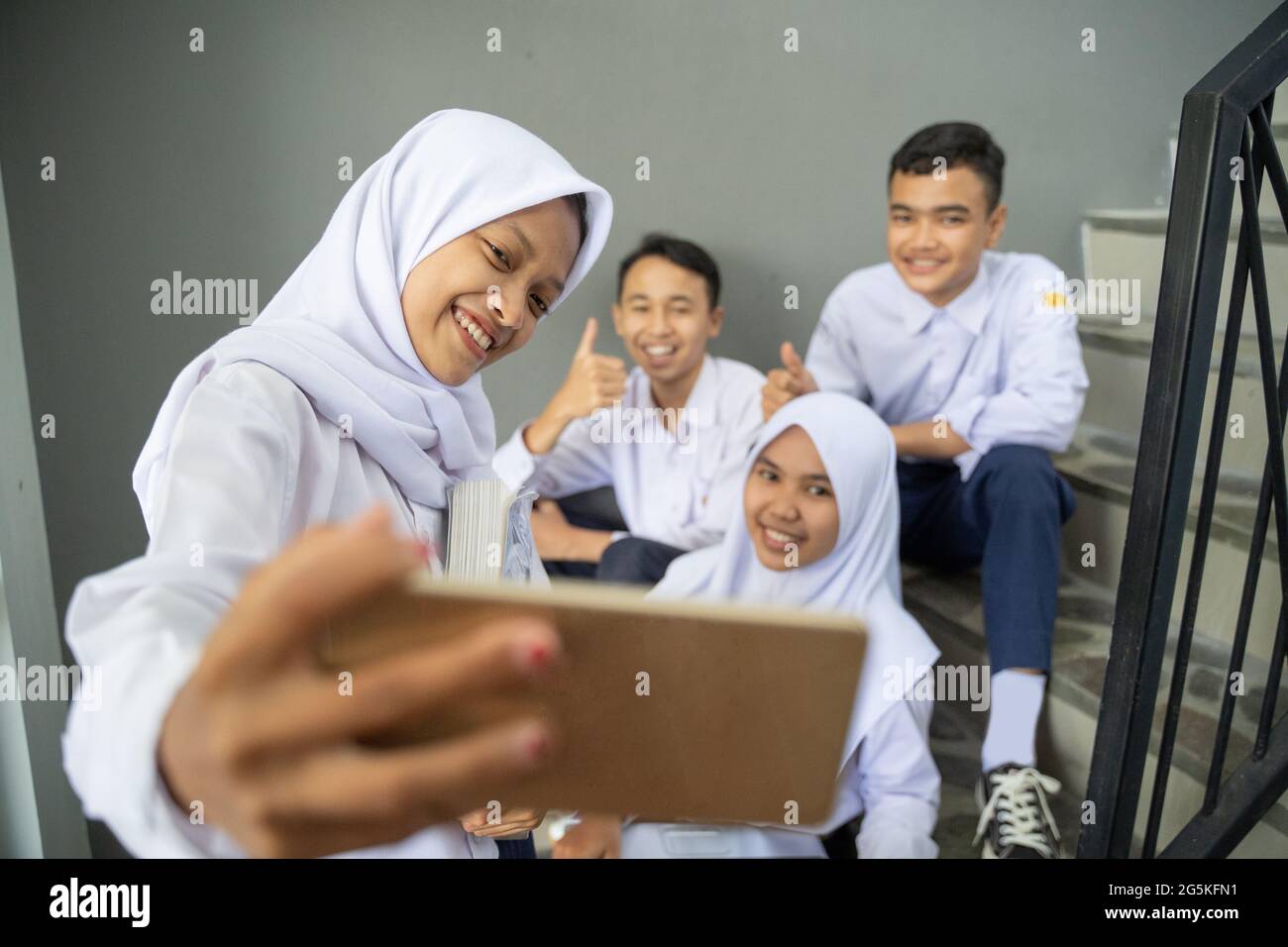 Teenagers school uniform phone hi-res stock photography and images - Alamy