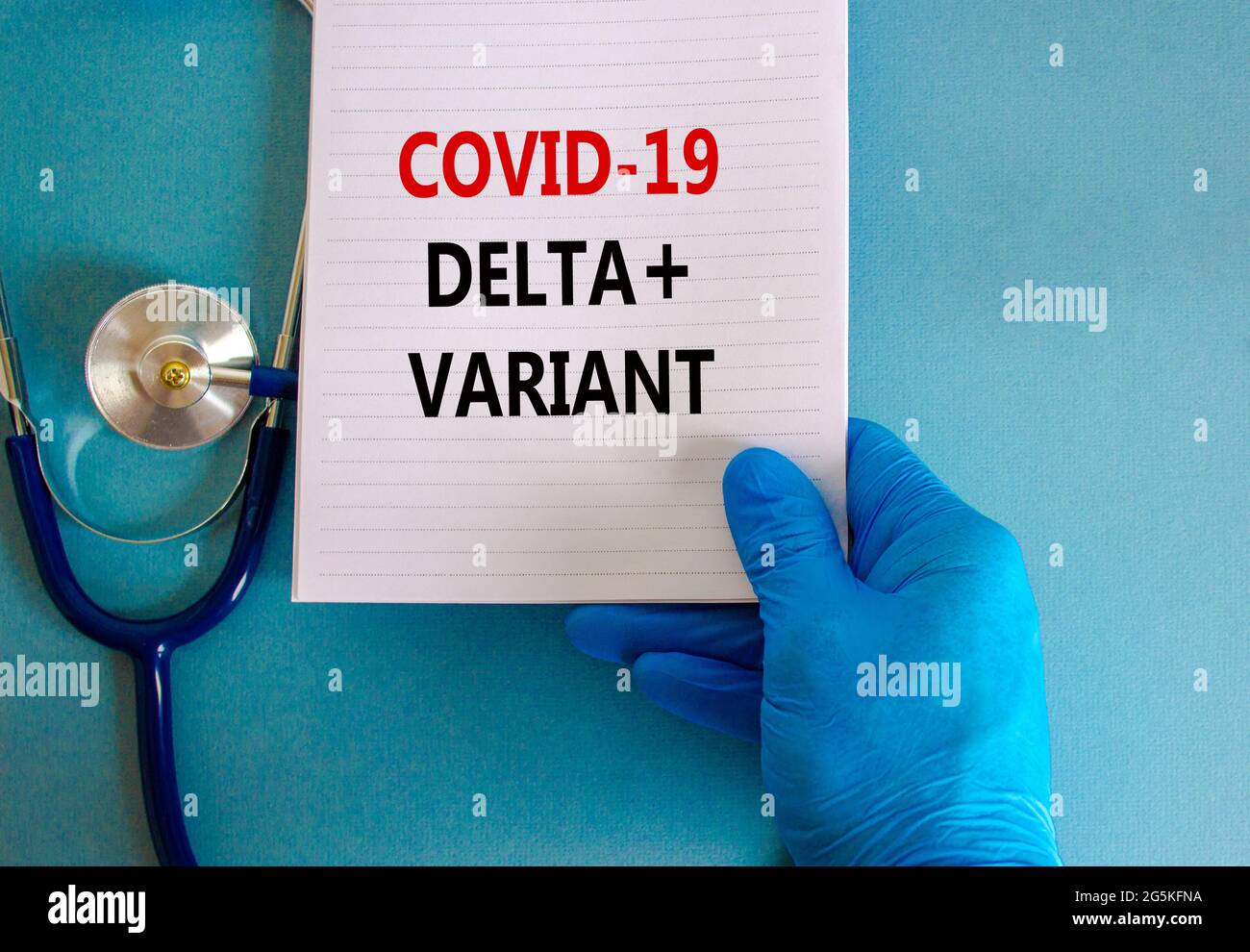 Covid-19 delta plus variant strain symbol. Doctor hand in blue glove ...