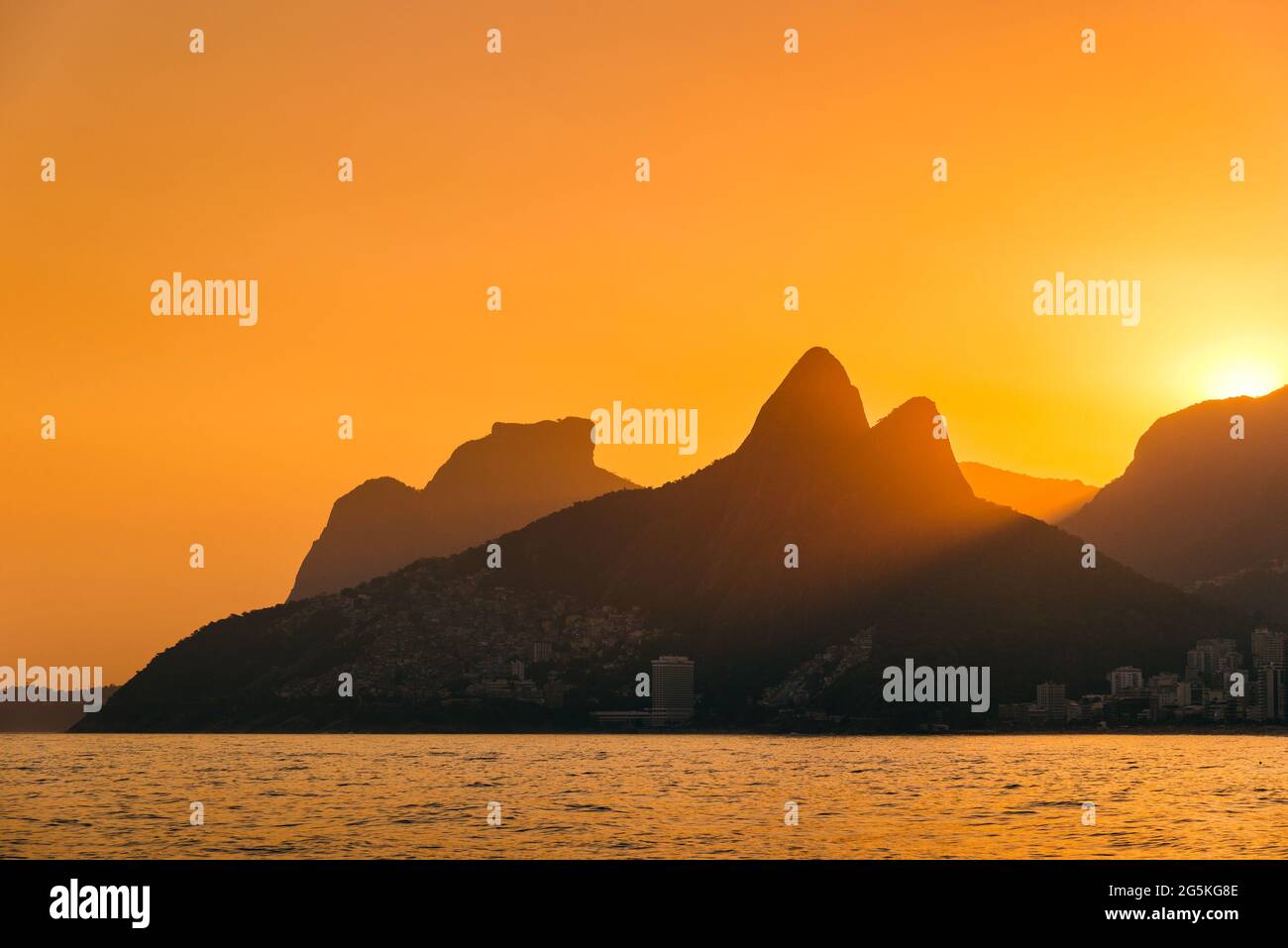 Sun Setting Behind Mountains of Rio de Janeiro Stock Photo - Alamy
