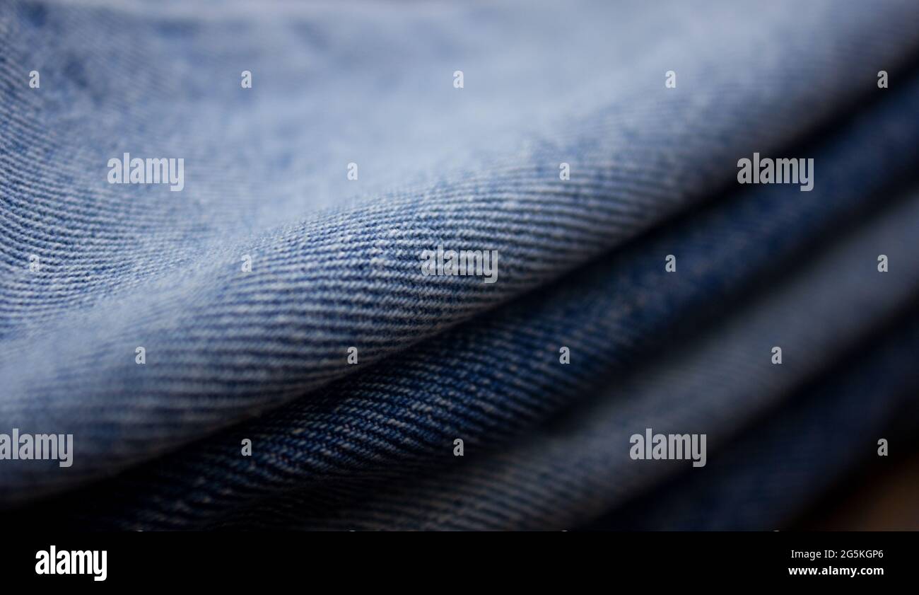 A stack of denim. Color denim close-up texture Stock Photo - Alamy
