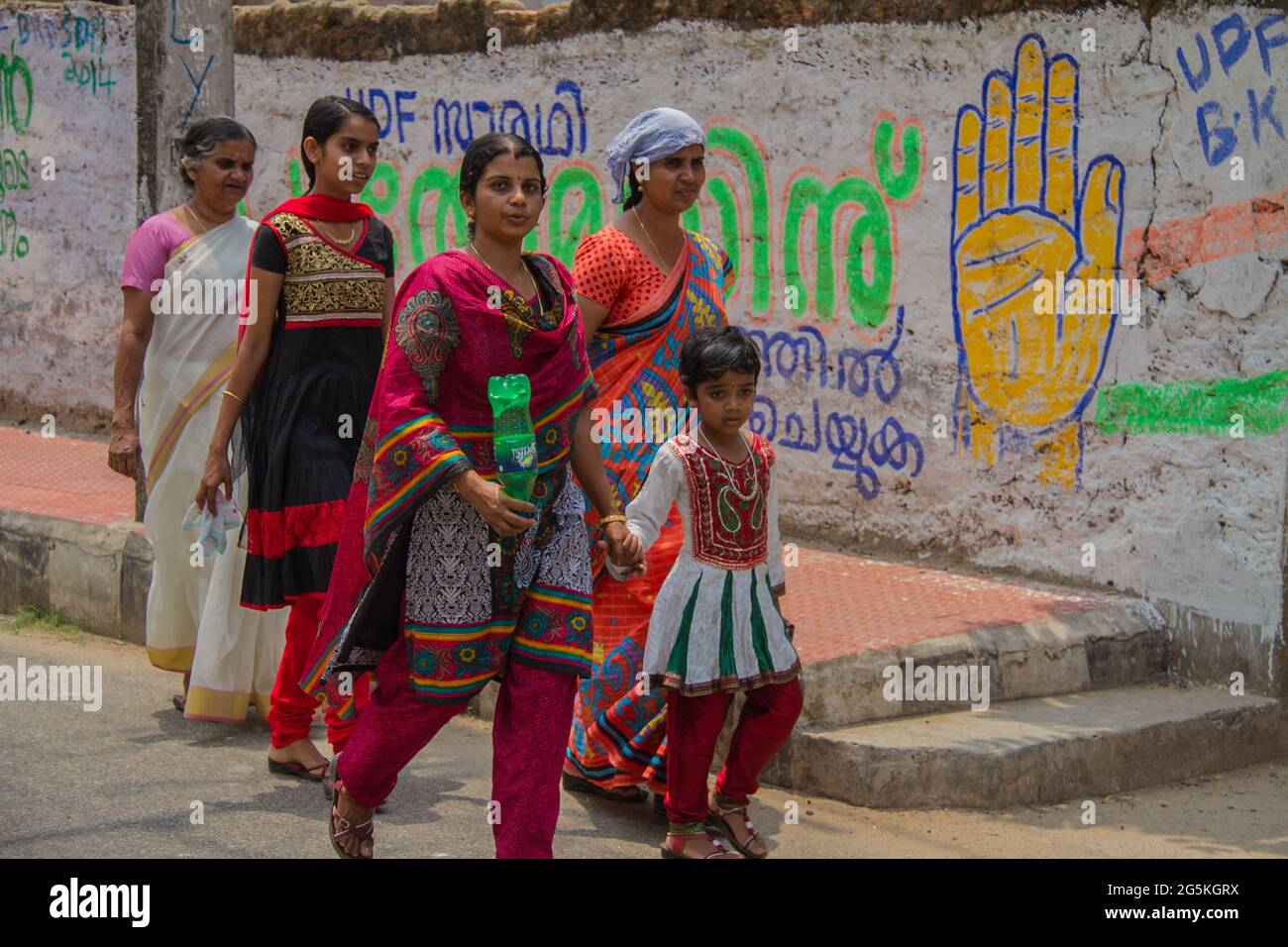 Family visiting local market Stock Photo - Alamy