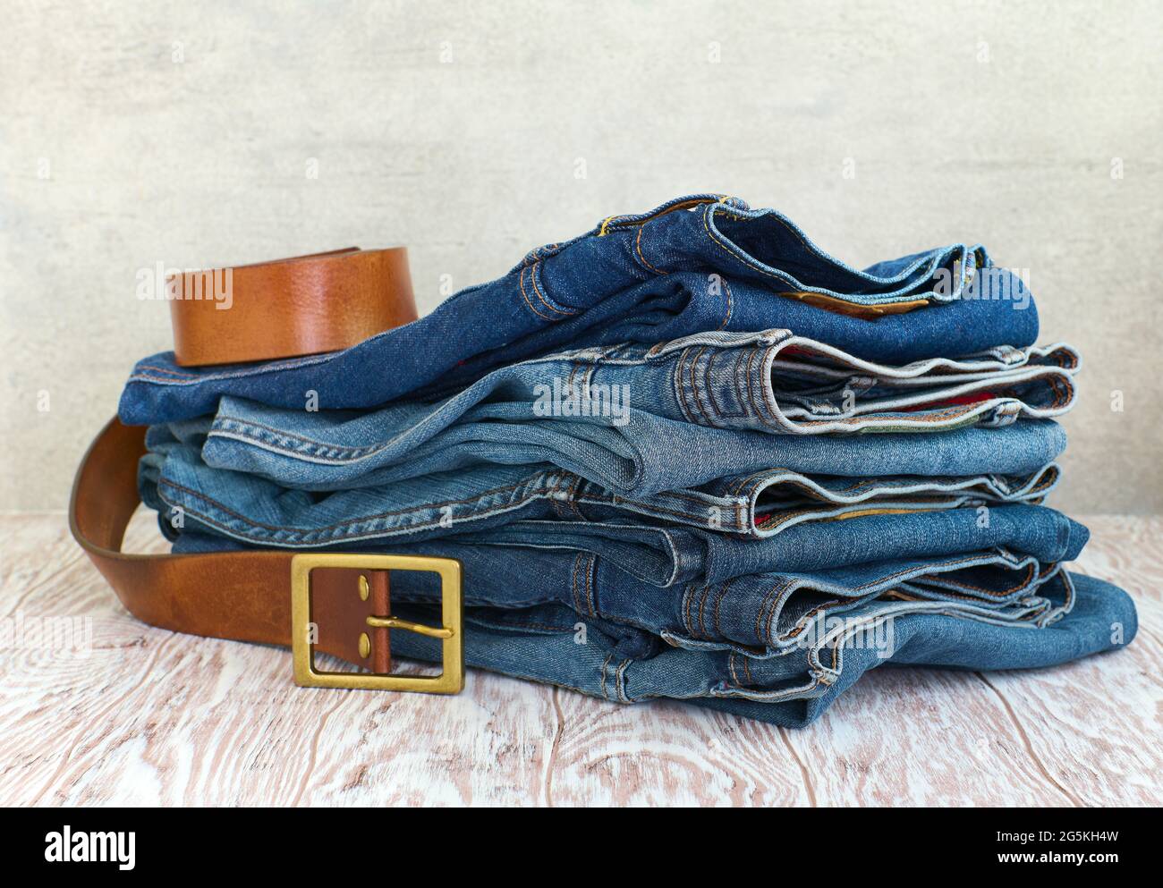 Folded jeans hi-res stock photography and images - Alamy