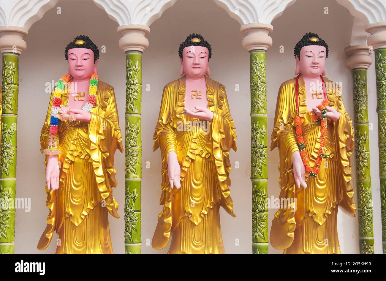 Three buddha statues at the historic kek lok si buddhist temple in ...