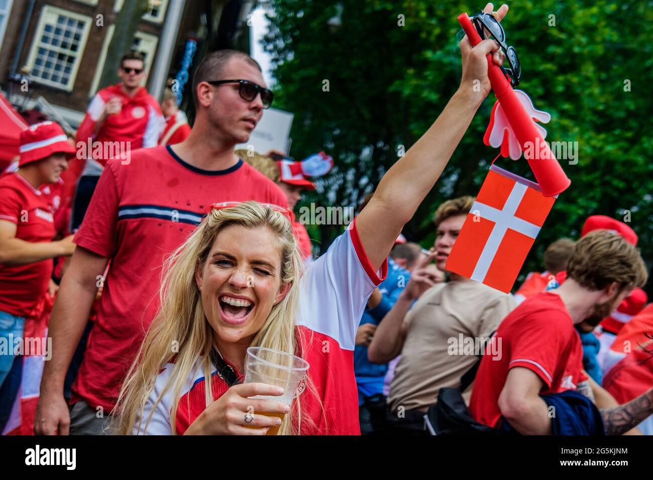 Amsterdam, Netherlands. 26th, June 2021. Danish football fans dressed ...