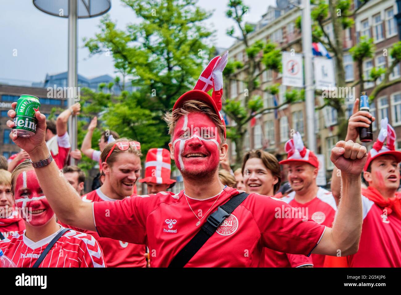 Amsterdam, Netherlands. 26th, June 2021. Danish football fans dressed ...