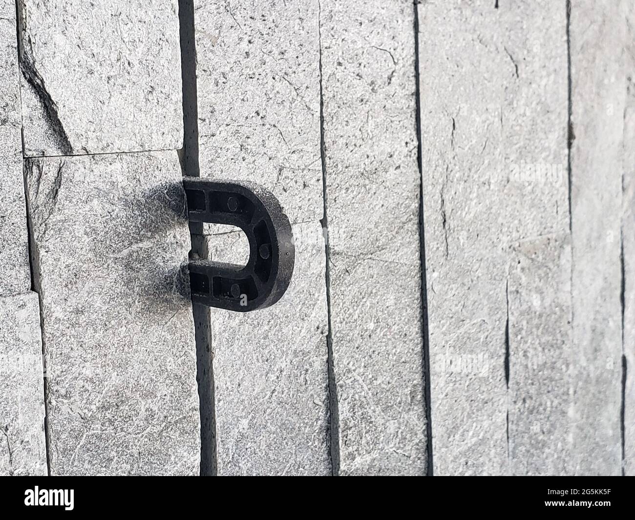 Metal shims for tile installation Stock Photo - Alamy