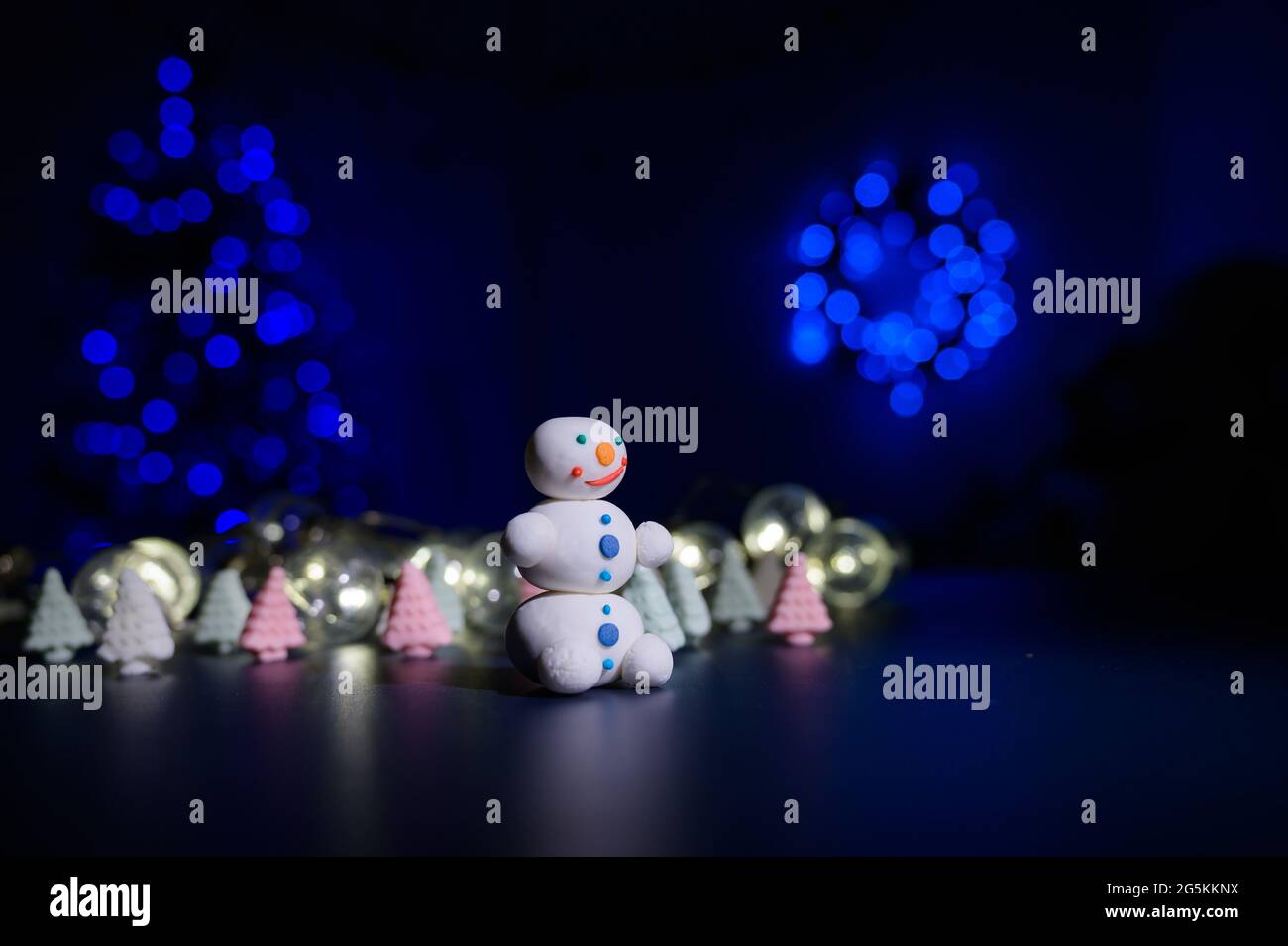 Cute snowman and little Christmas trees made of marshmallows on the ...