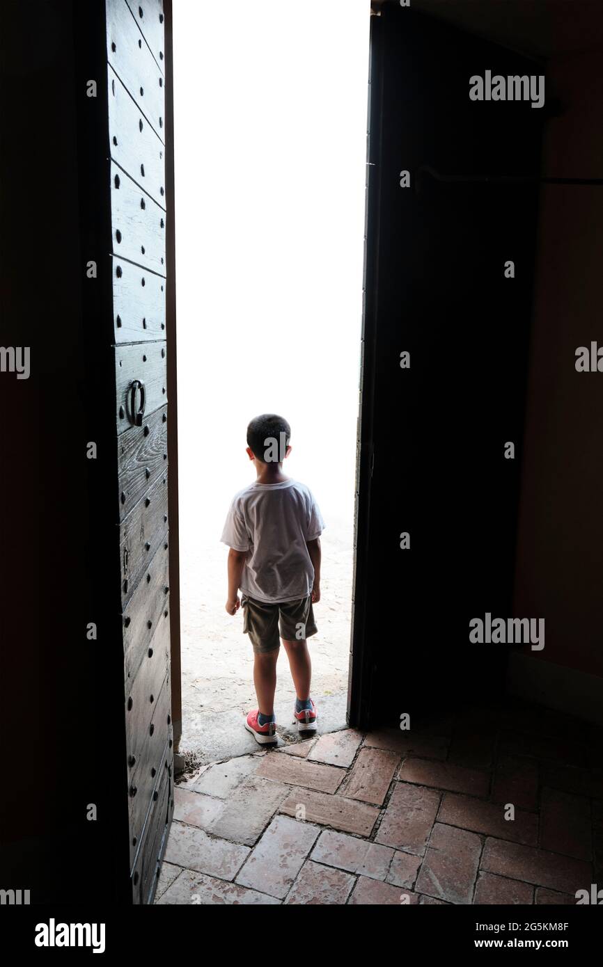 child coming out the door - ready for a new challenge to be free ...