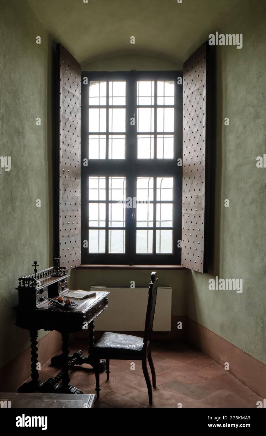 Medieval fortress Cabinet with writing desk with a book and wooden ...