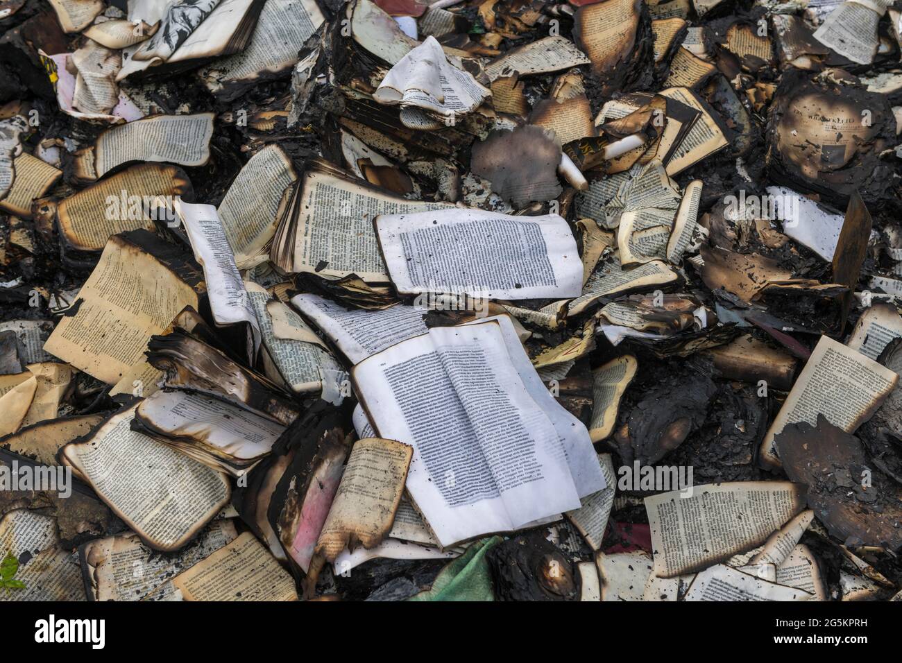Charred remains of books after arson, Germany, Europe Stock Photo - Alamy