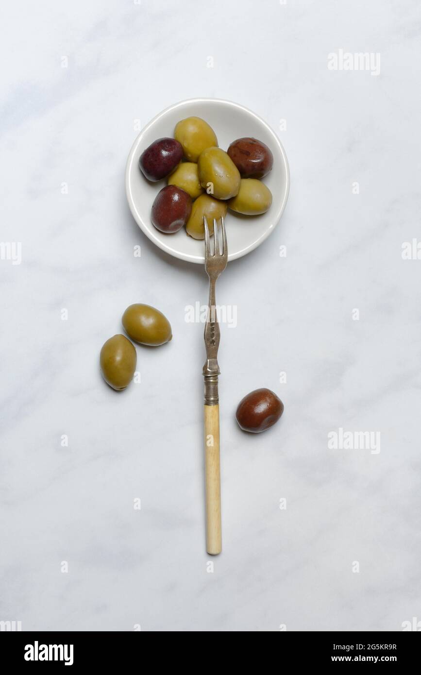 Small black olives hi-res stock photography and images - Alamy