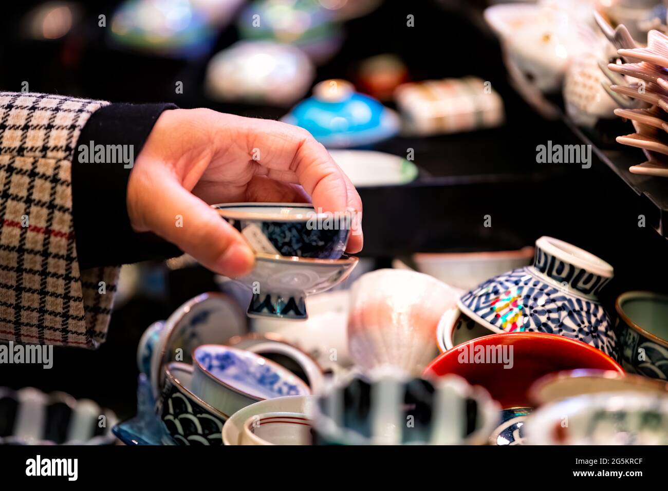 Store display closeup of ceramic pottery with tea cups teacups design ...