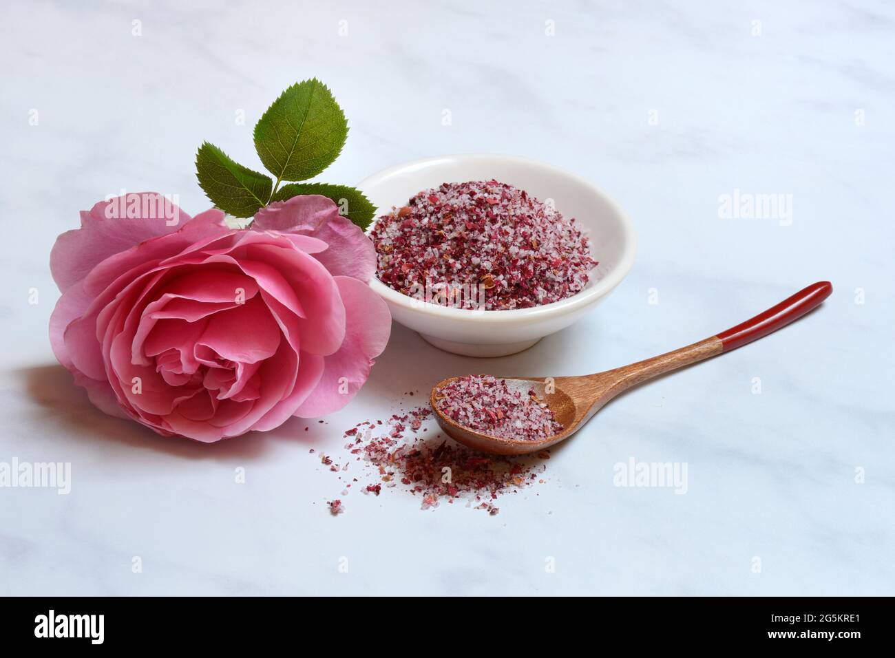 Rose salt in bowl and spoon, rose petal salt, Germany, Europe Stock ...