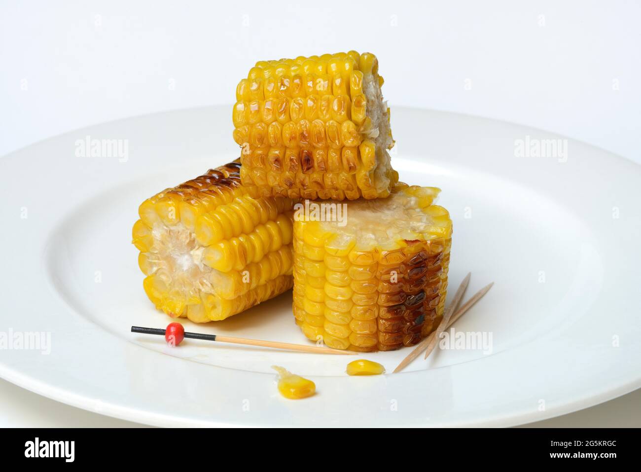 Grilled corn on the corn cob, cut up, on plate, Germany, Europe Stock ...