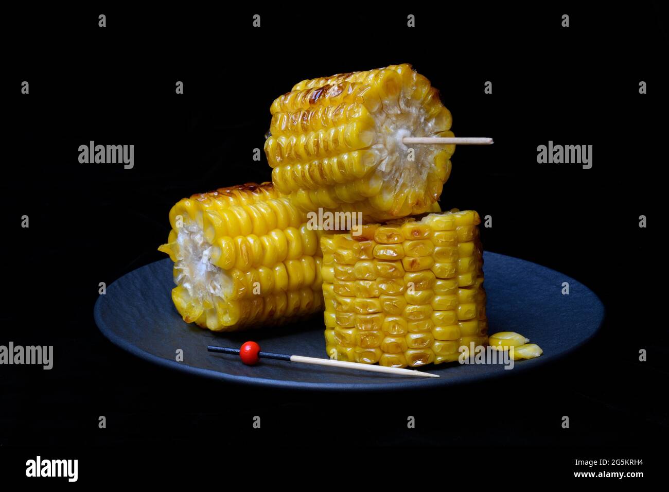 Grilled corn on the corn cob, cut up, on plate, Germany, Europe Stock ...