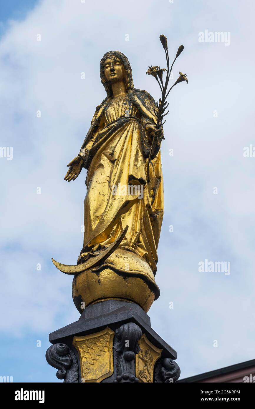 Figure of the Virgin Mary on the town hall fountain, moated castle am ...