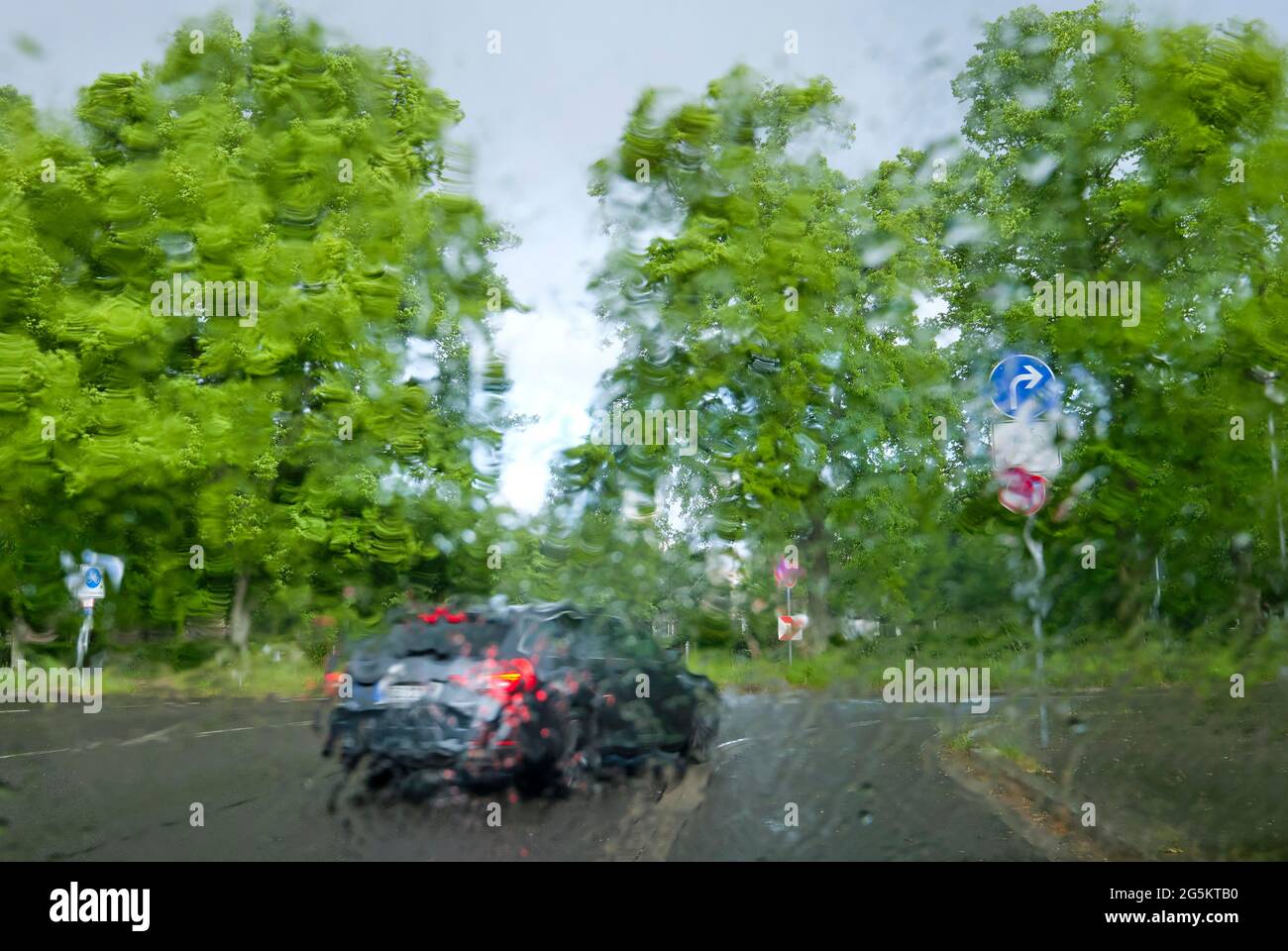 Rainy weather, view through rainy windshield while driving, Germany ...
