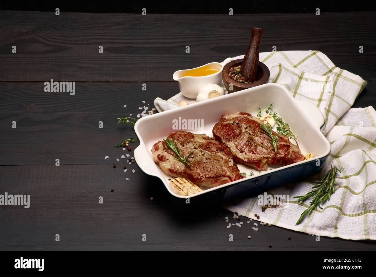 Grilled roated beef steaks in baking dish Stock Photo - Alamy