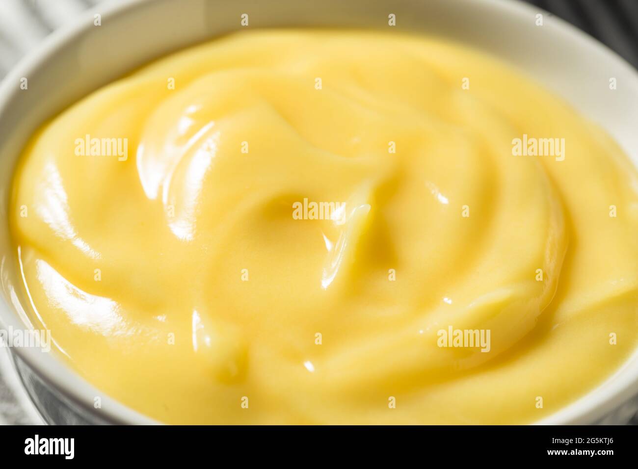 Homemade Yellow Vanilla Pudding to Eat for Dessert Stock Photo - Alamy